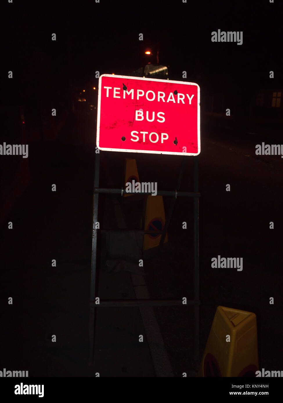 red road sign at night temporary bus stop; essex; england; uk Stock ...