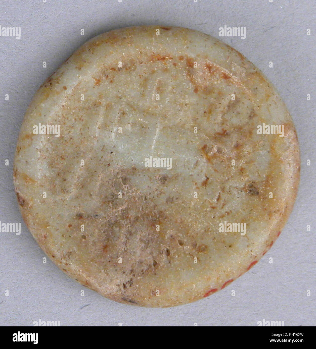 Illustration of a 12th–13th-century Egyptian glass coin weight, showing ...