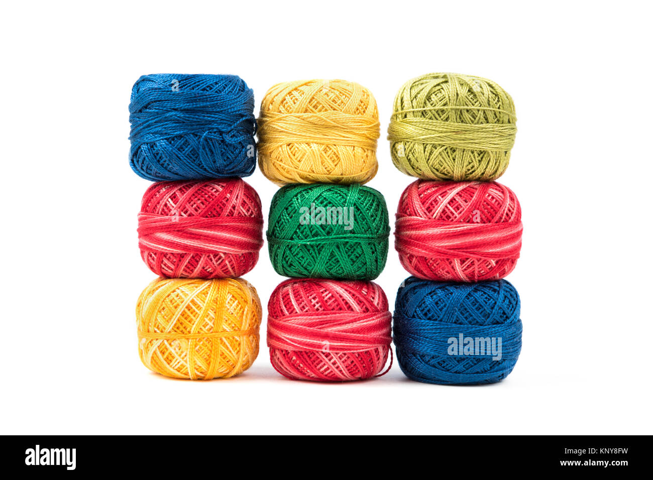Colorful sewing threads as background or wallpaper Stock Photo - Alamy