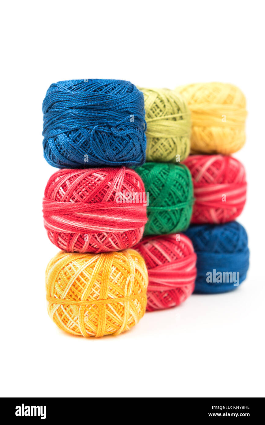 Colorful sewing threads as background or wallpaper Stock Photo - Alamy