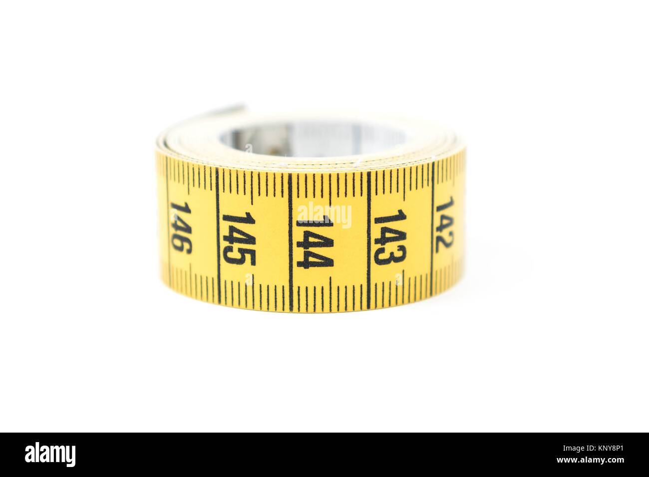 Yellow measuring tape. Sewing and tailoring accessories Stock Photo - Alamy