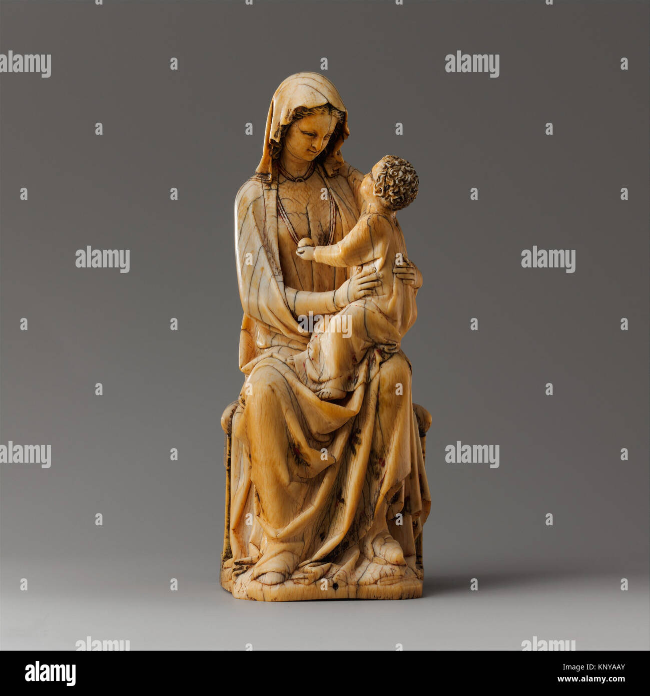 Religious painting of the Virgin Mary seated with the infant Jesus ...