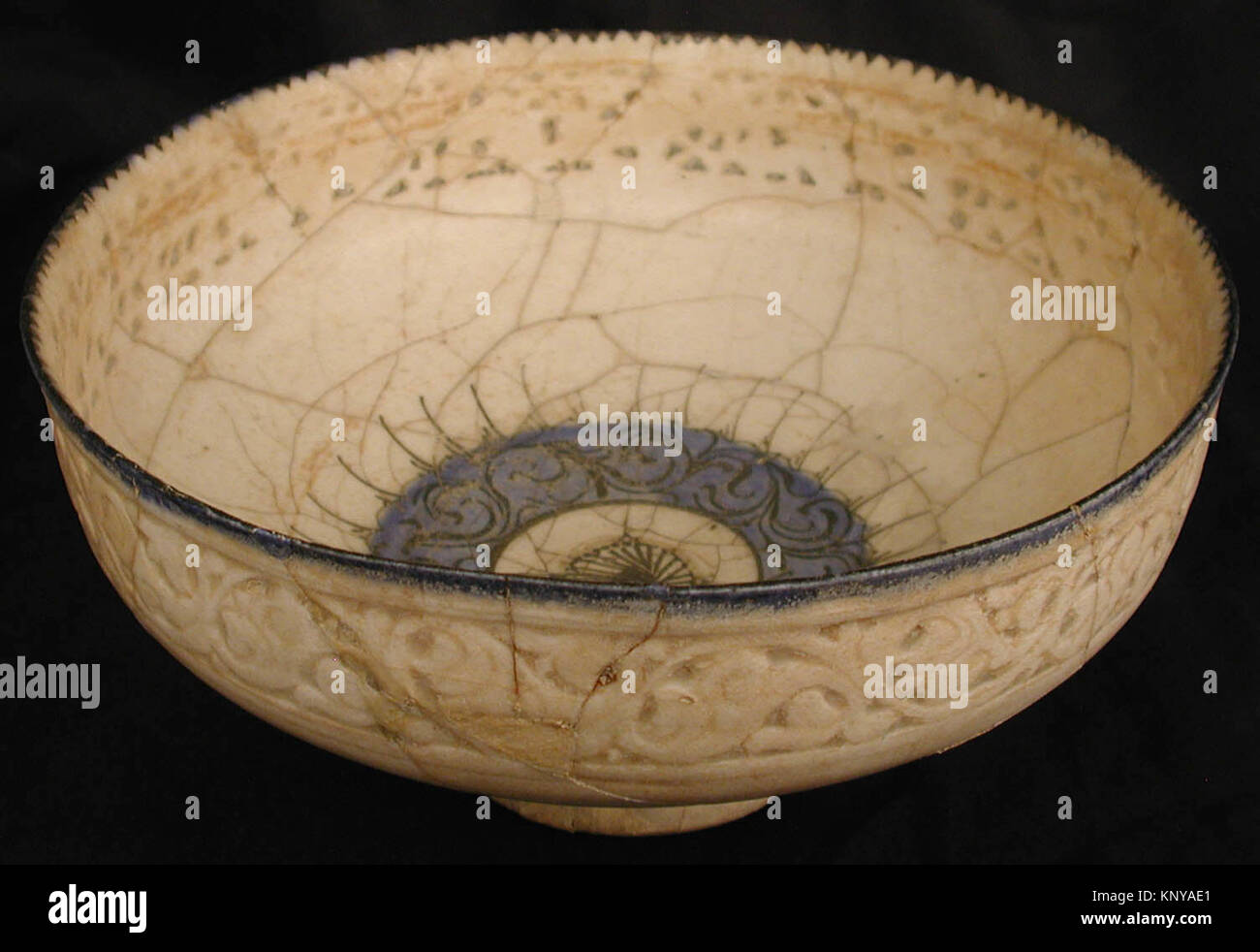 This ceramic bowl is a historical artifact used for holding food or ...