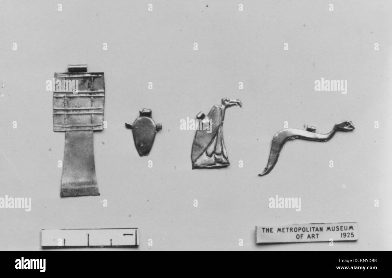 Four ancient Egyptian amulets depicting Djedmutesankh symbols: cobra ...