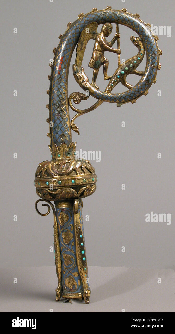 This illustration shows the head of a crozier featuring Saint Michael ...