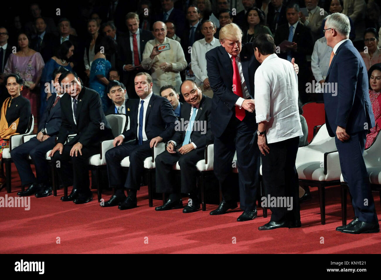 U.S. President Donald Trump shakes hands with Philippine President ...