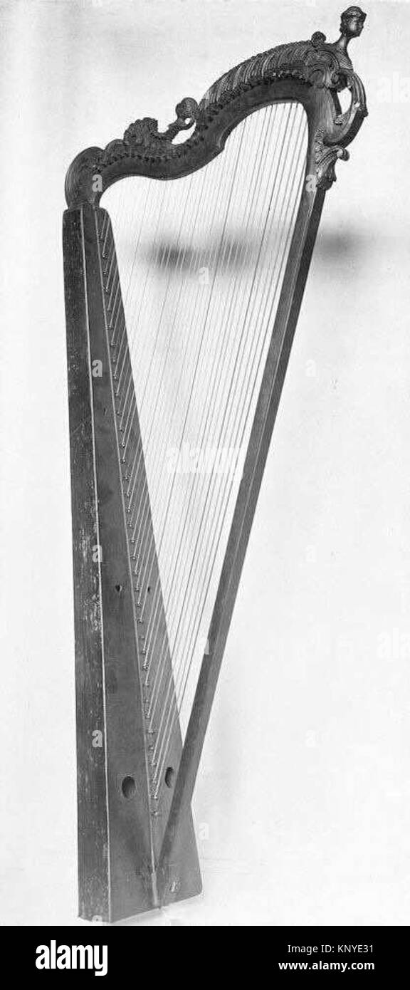 This MET Gothic harp is a triangular stringed instrument illustrating ...