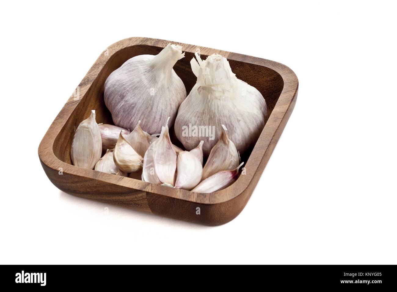 bowl full of garlic Stock Photo - Alamy