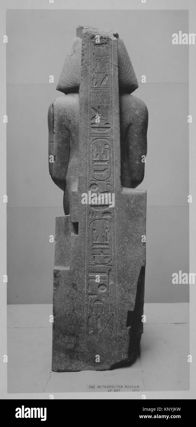A monumental seated statue of Pharaoh Amenhotep III, reinscribed by ...