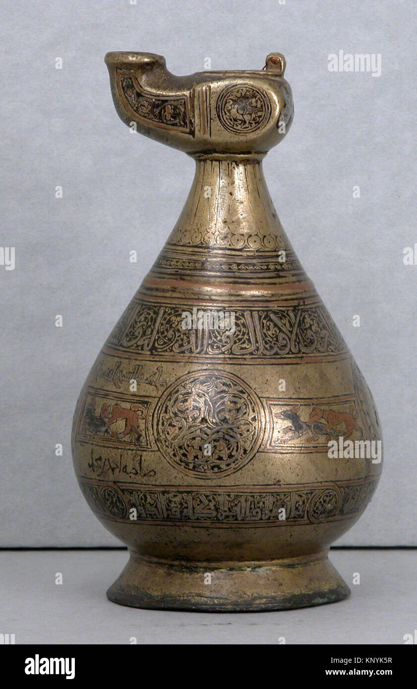 This ewer, featuring a lamp-shaped spout, showcases intricate design ...