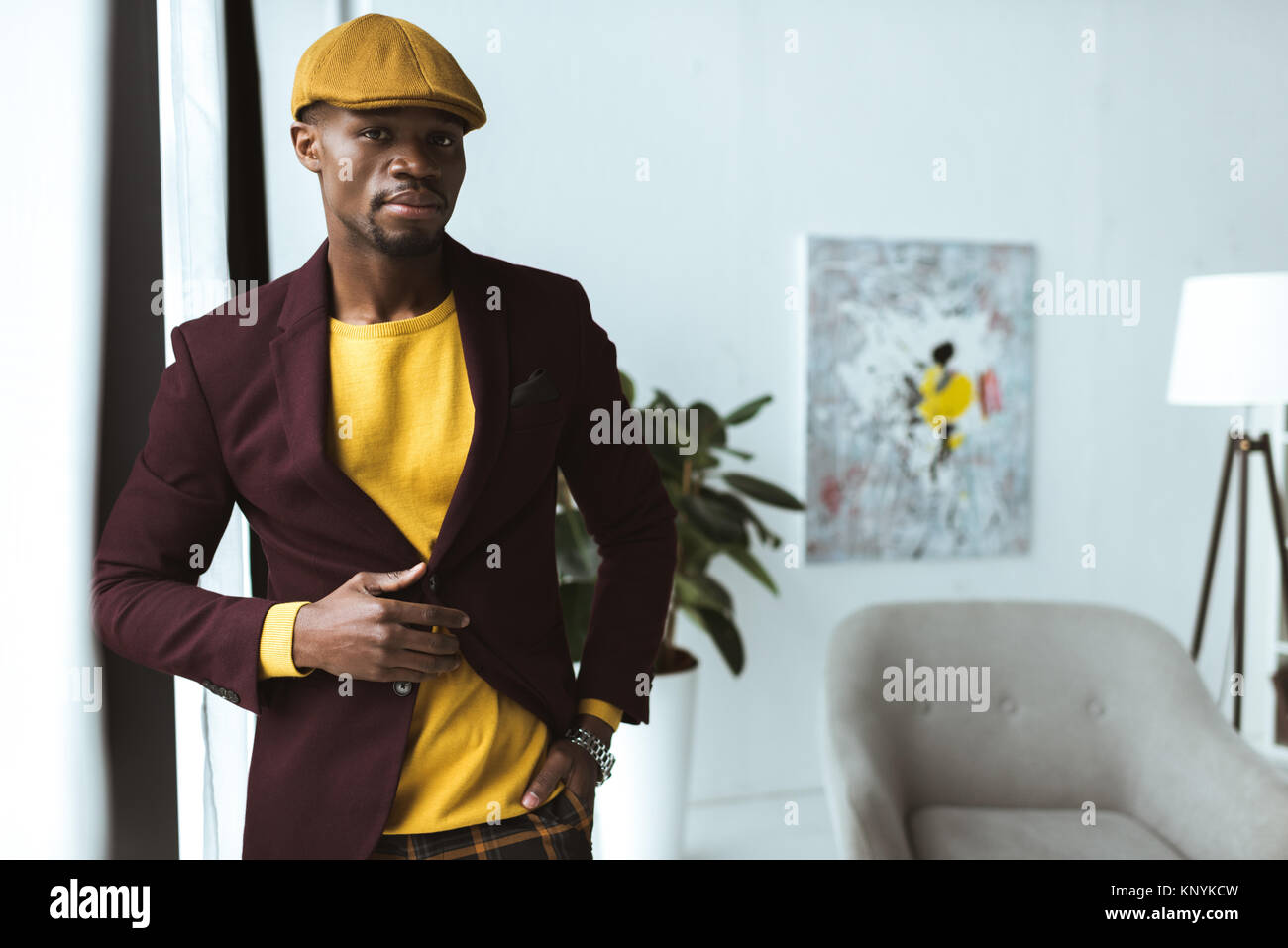 stylish man in cap and jacket Stock Photo - Alamy