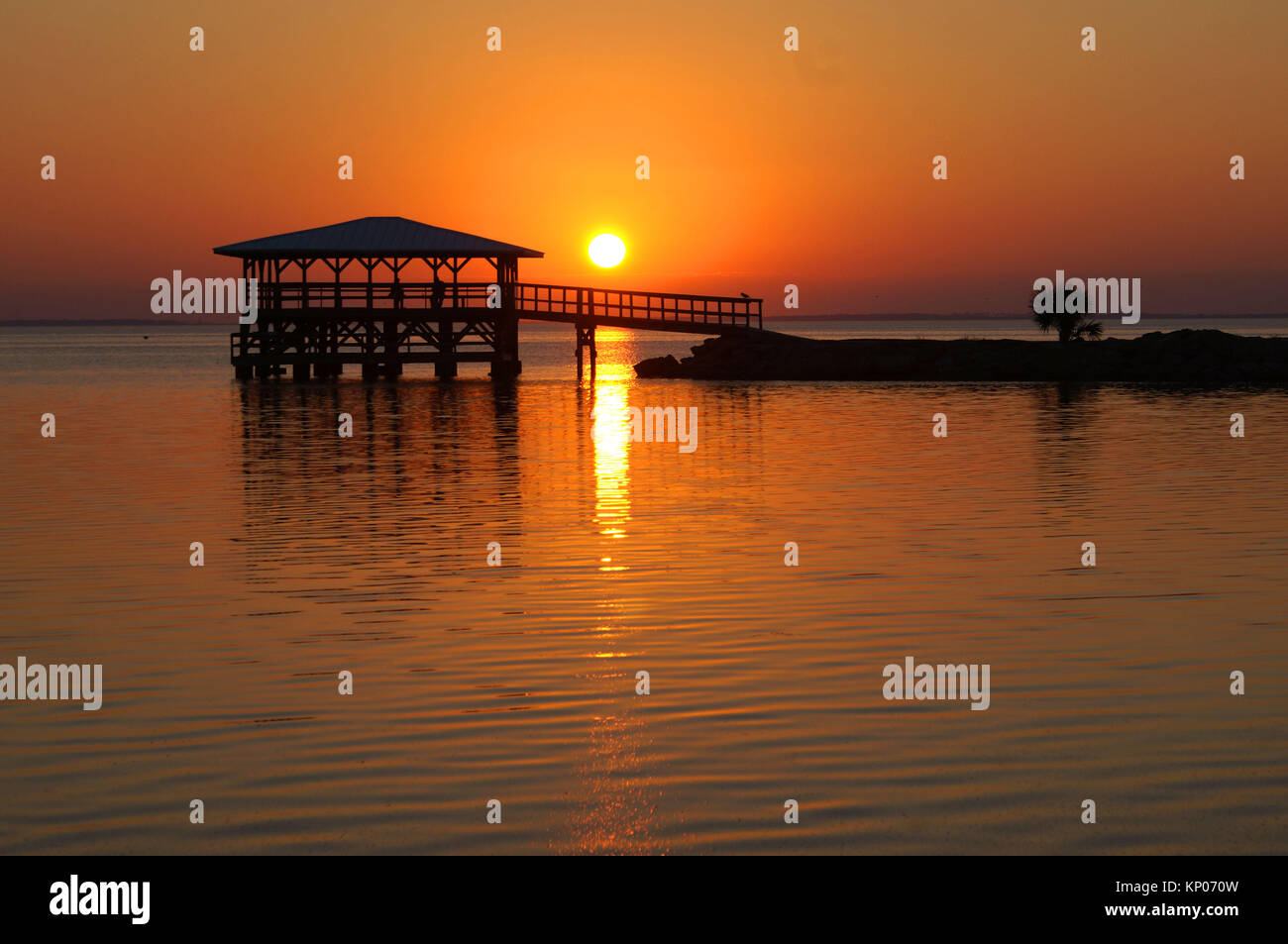 Pier In Sunset Stock Photo - Alamy