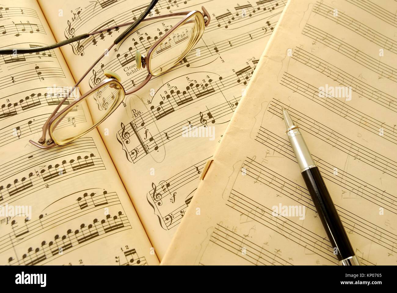 Music score, manuscript and pen with sepia effect to signify aging and ...