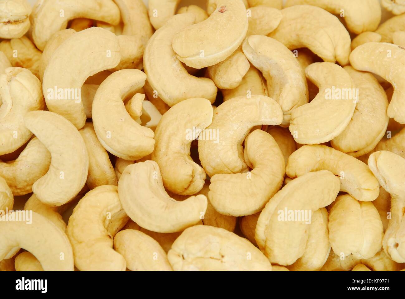 Closeup of cashew nuts. Signifying food and beverage, and healthy and ...