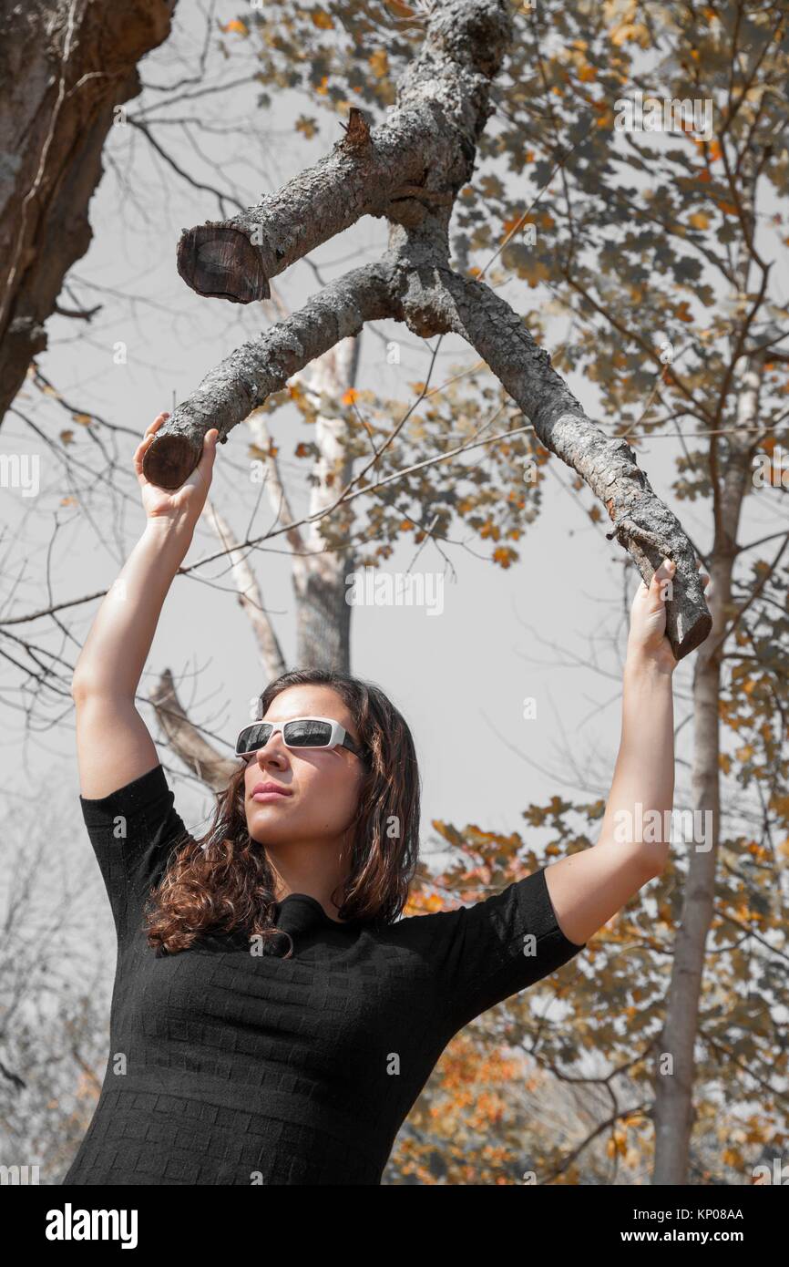Holding onto tree branch hi-res stock photography and images - Alamy