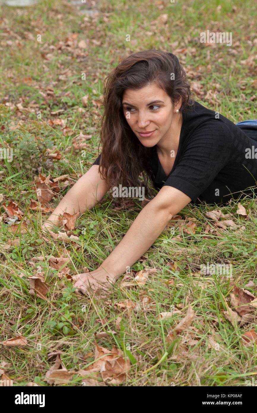 Dead woman lying outdoors hi-res stock photography and images - Alamy