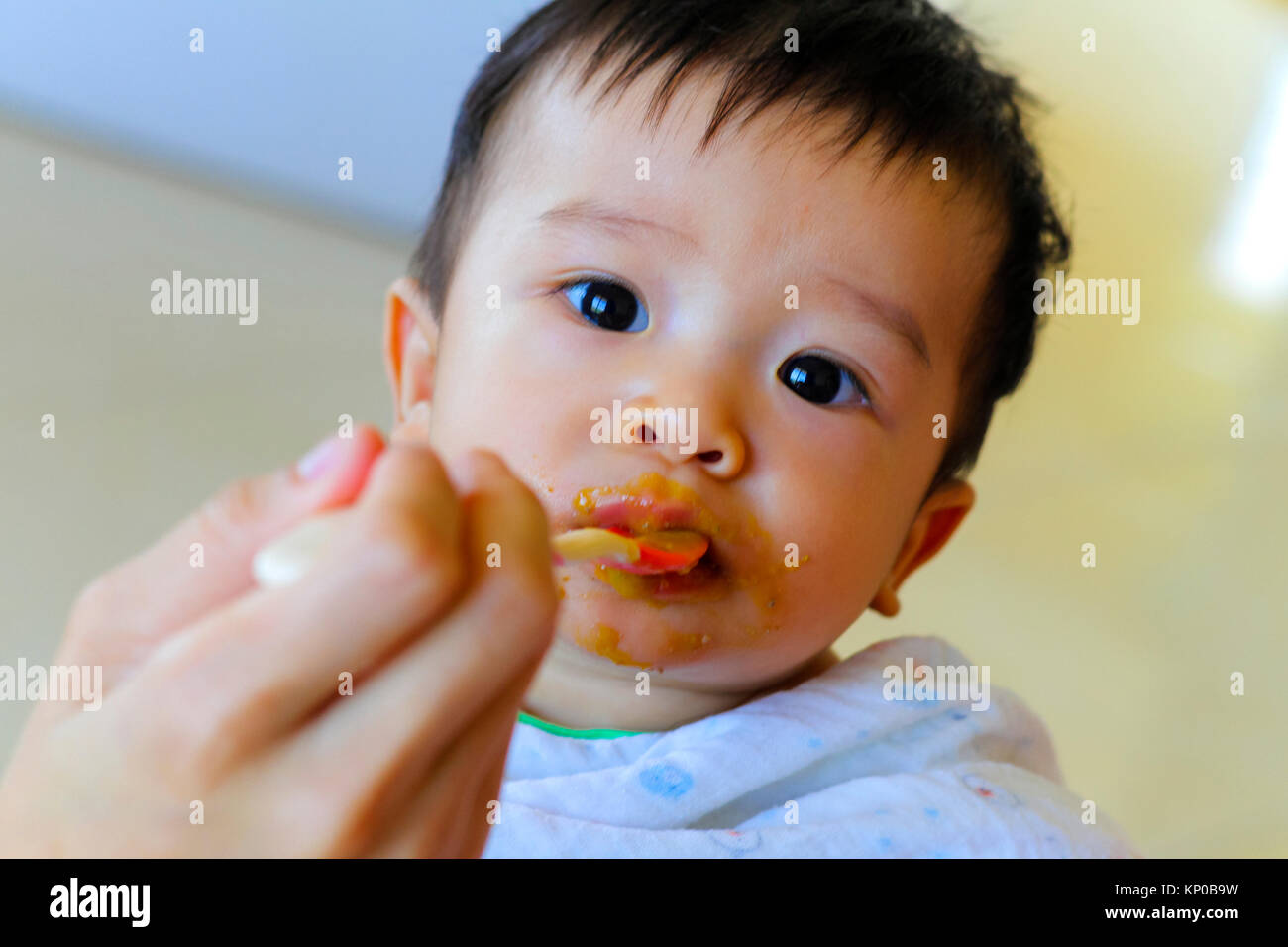 Chinese child eating ice cream hi-res stock photography and images - Alamy