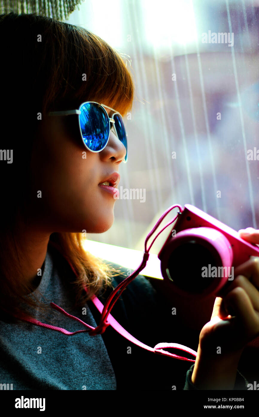 Portrait of beautiful girl beside windows on sunny morning Stock Photo ...