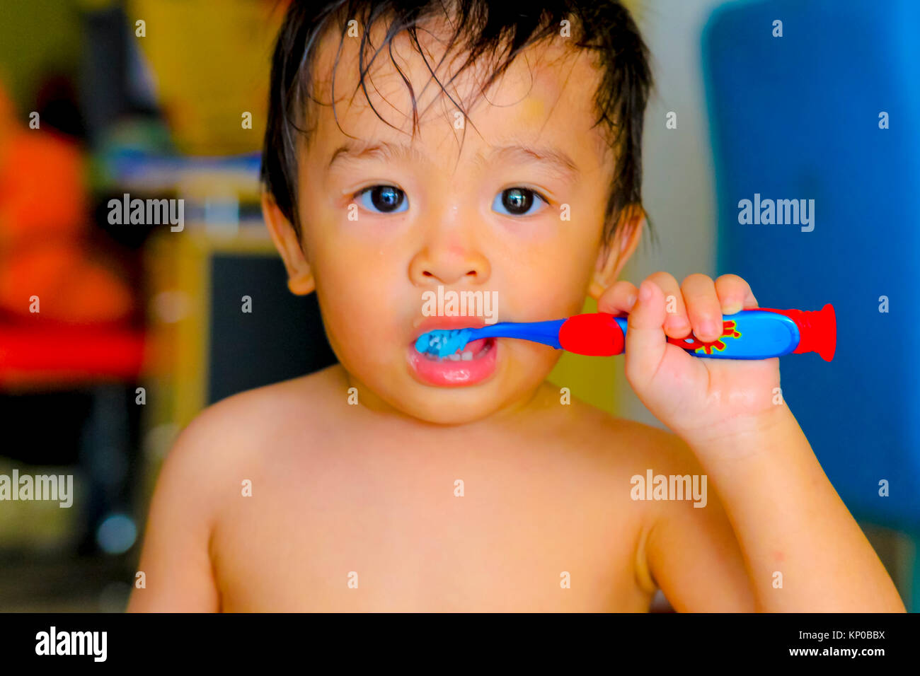 kid boy brushing teeth and smiling Stock Photo - Alamy
