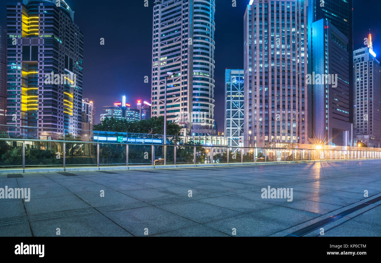 empty square with modern building in background at night Stock Photo ...