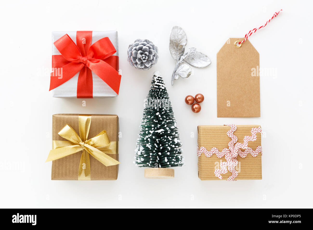 Gift boxes and christmas decoration with tag on white background Stock ...