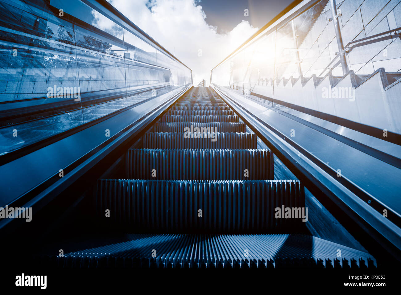 Escalator in an underground station with skyline in background Stock ...