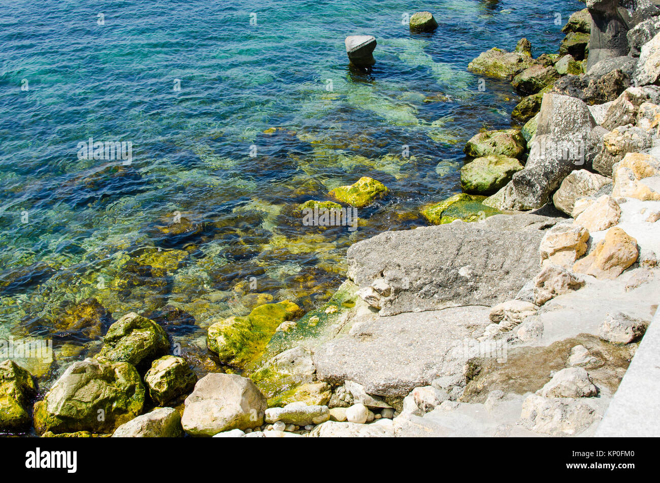 rocks in the sea Stock Photo - Alamy