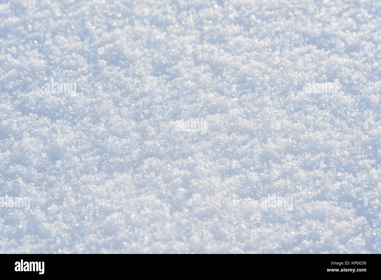 Winter white snow on the sun. background texture Stock Photo - Alamy