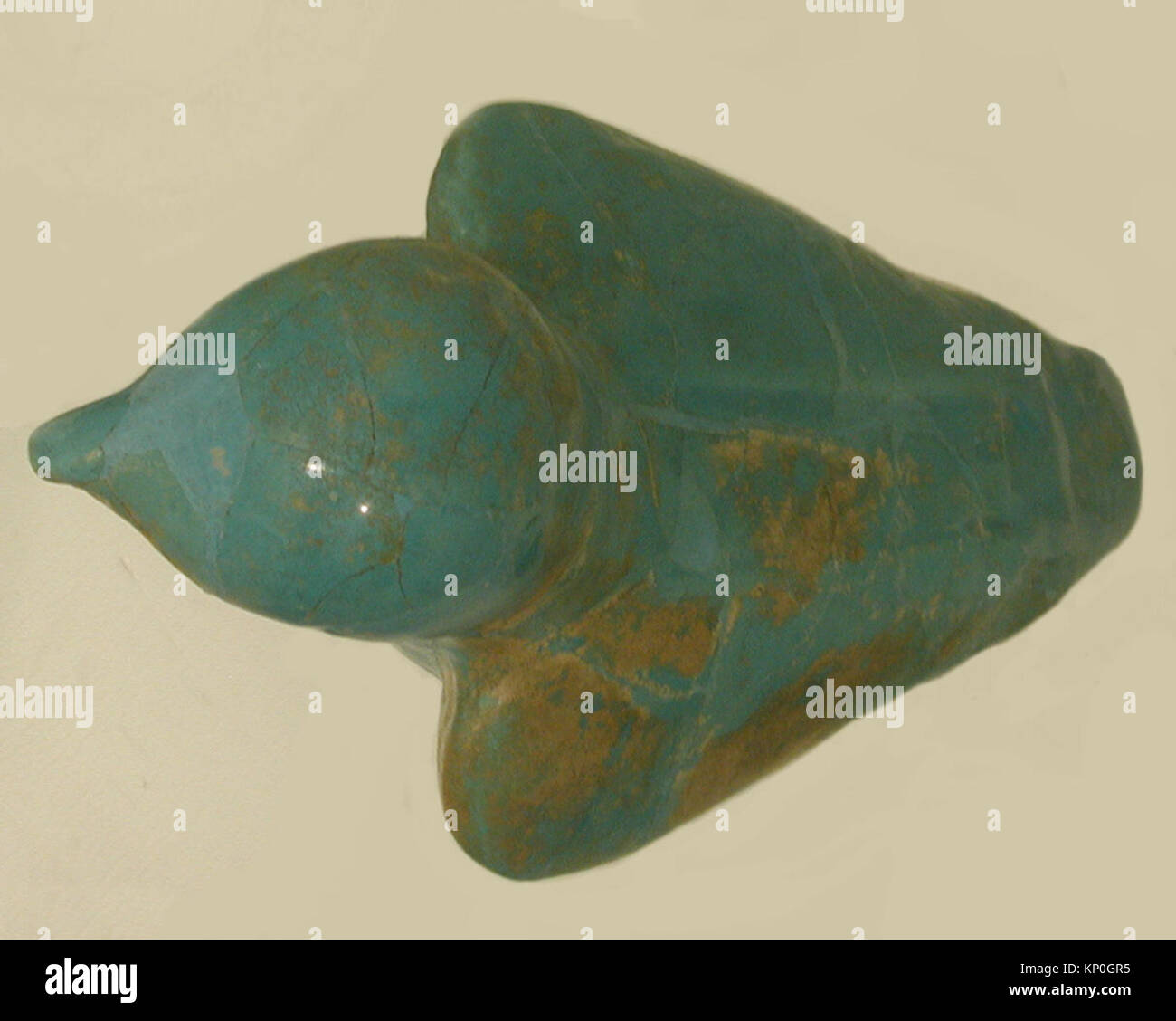 This figure depicts a predatory bird, skillfully crafted to represent ...