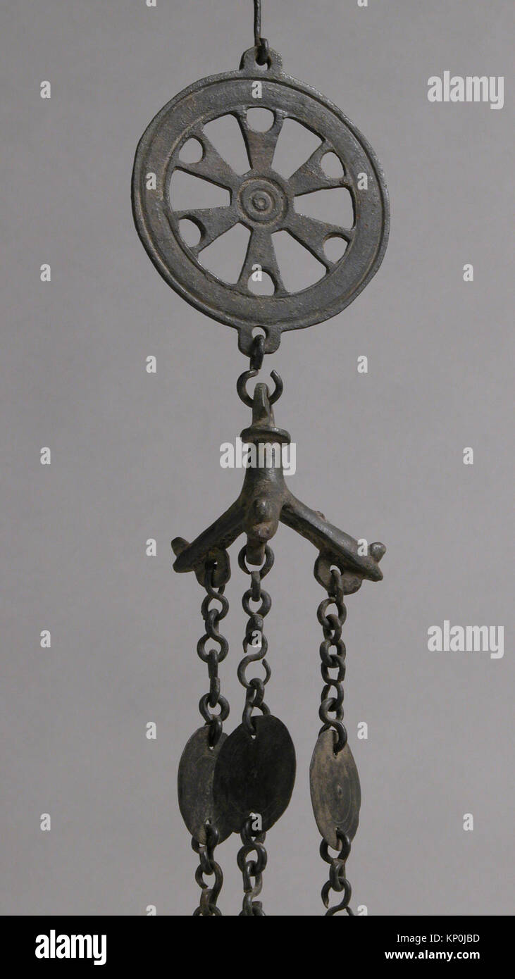 Ceremonial metal censer for incense burning, featuring suspension ...