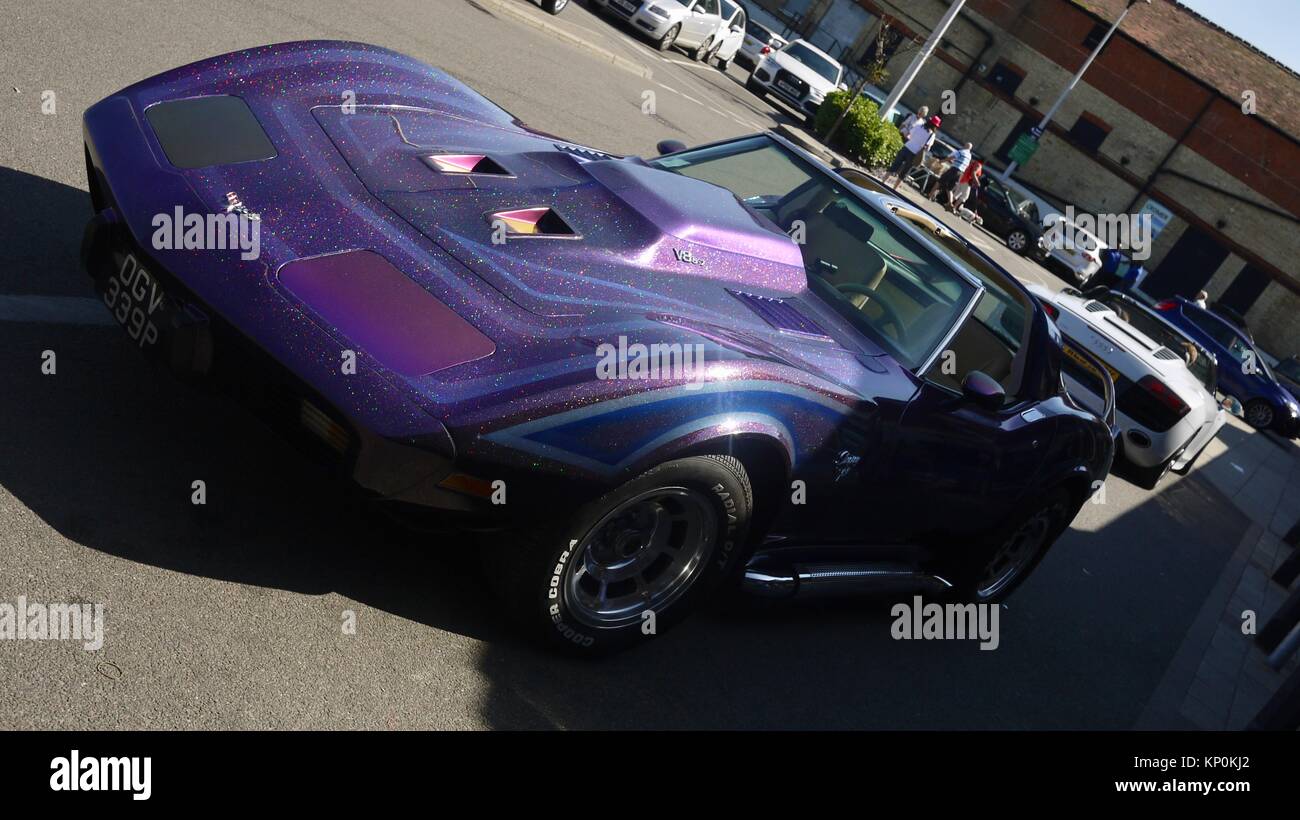 Sparkling purple 1987 Chevrolet GMC Corvette parked in a car park in ...