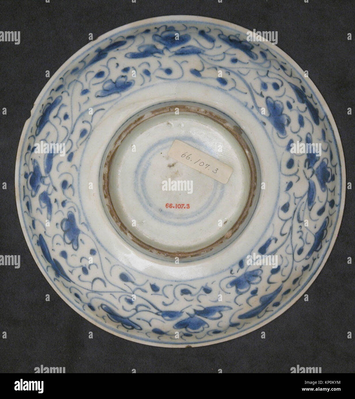 Ceramic dish featuring a shallow bowl shape and smooth surface, used ...