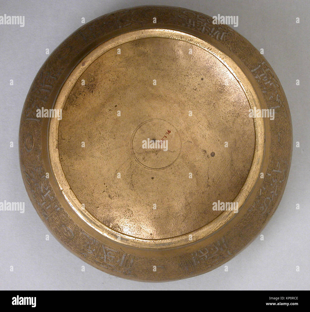 This mid-14th century Iranian brass bowl is engraved and inlaid with ...