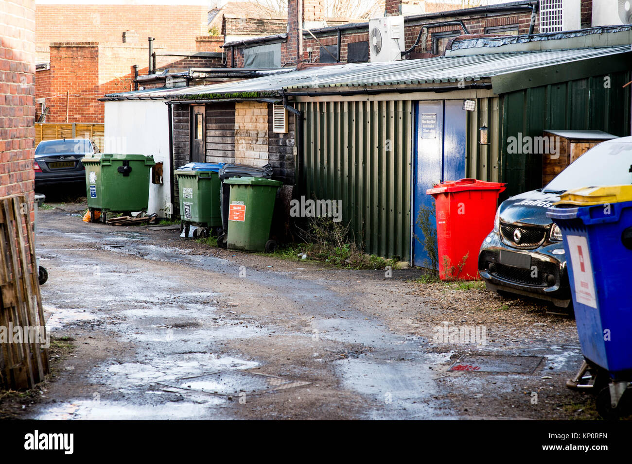 Basck Alley Behind Shops With Car Parking Area Stock Photo - Alamy