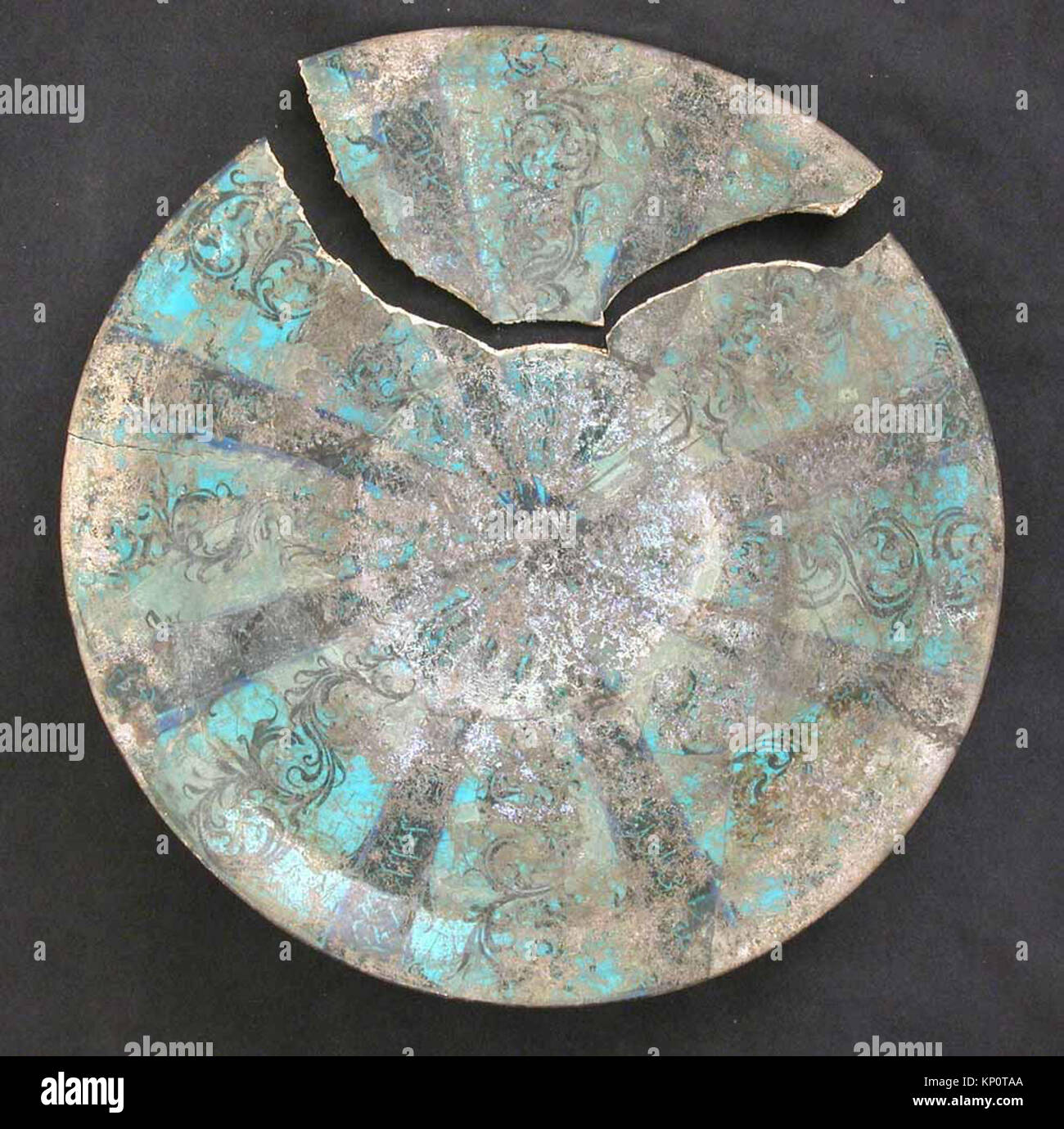 Museum ceramic dish with rounded form and glazed surface, illustrating ...