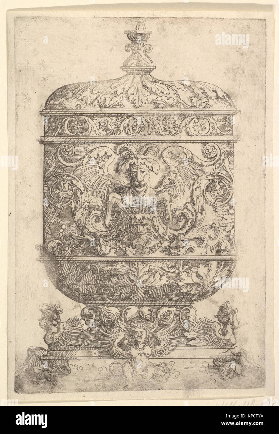 A covered goblet featuring grotesque motifs on a white background ...