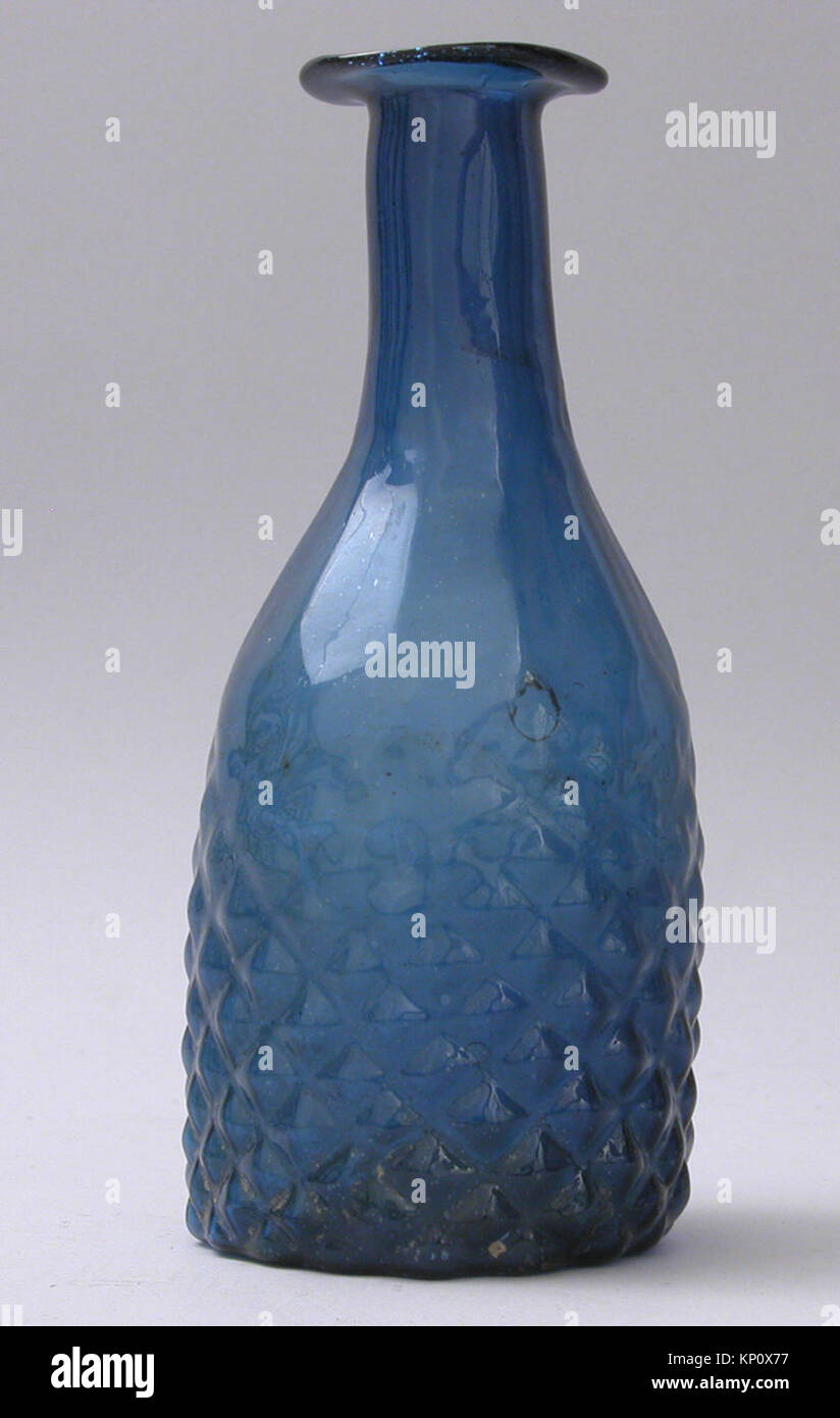 This bottle serves as a historic liquid container, illustrating design ...
