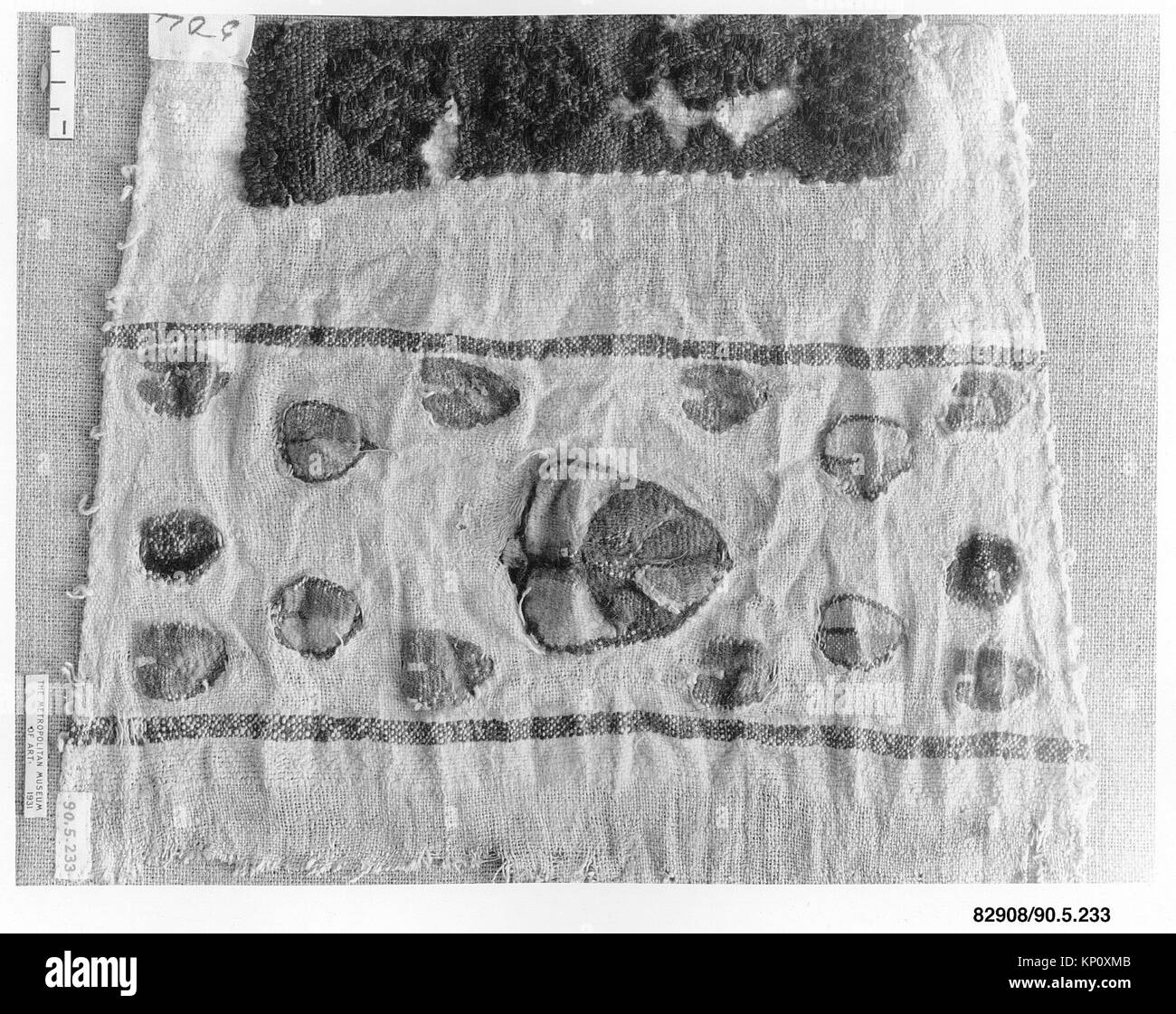 A fragment of an object showing part of its original shape and surface ...
