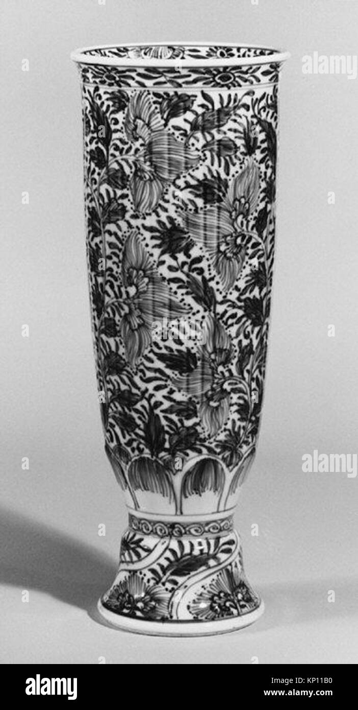 A cylindrical drinking beaker made of ceramic or metal, part of the MET ...