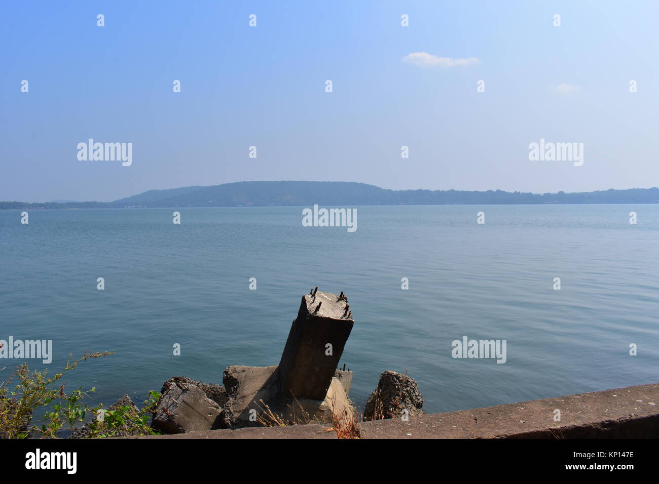 A concrete bollard beside the Chapora river estuary near Morjim Beach ...