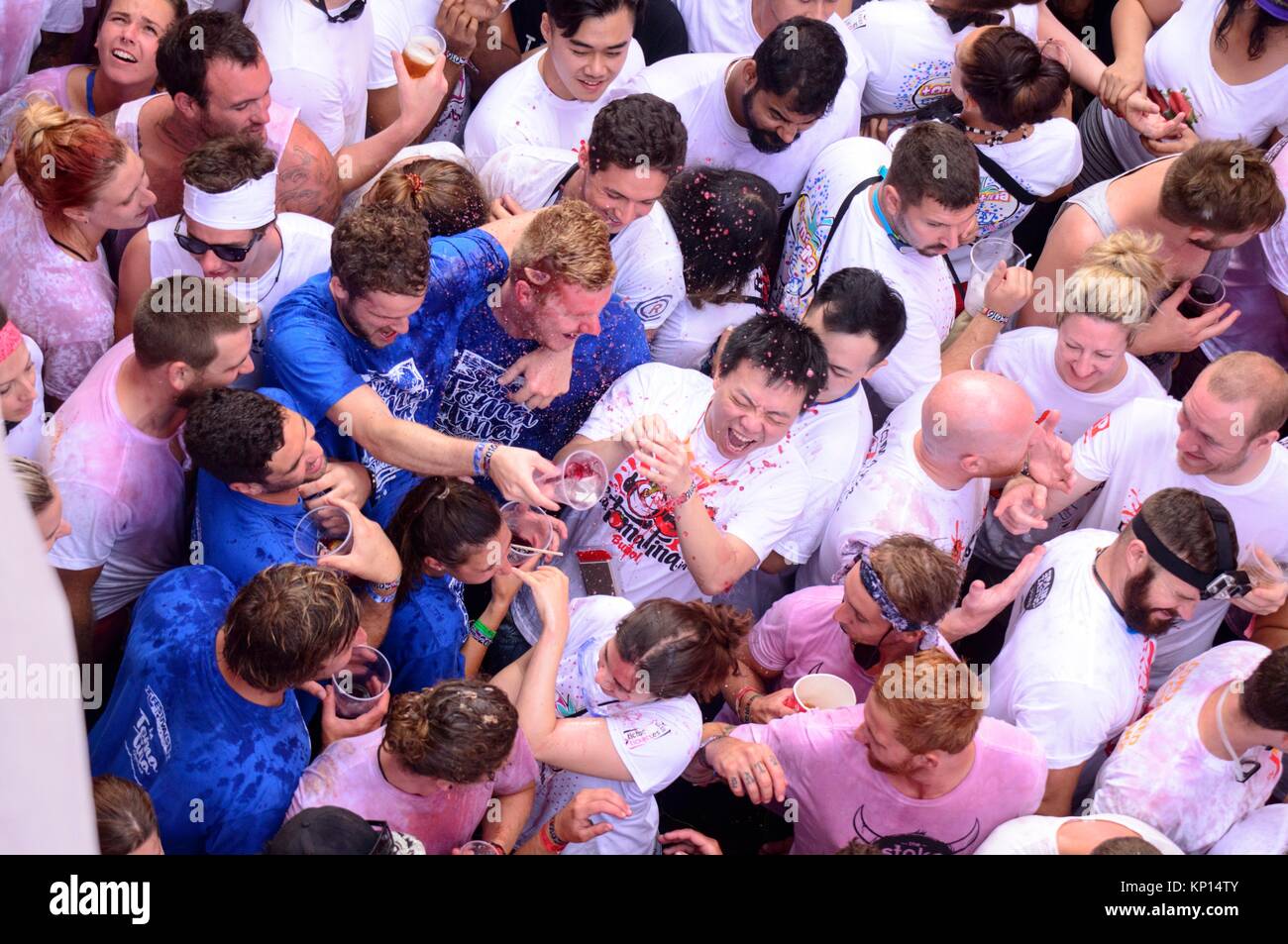 Young people enjoying the Tomatina, the world´s largest tomato fight ...