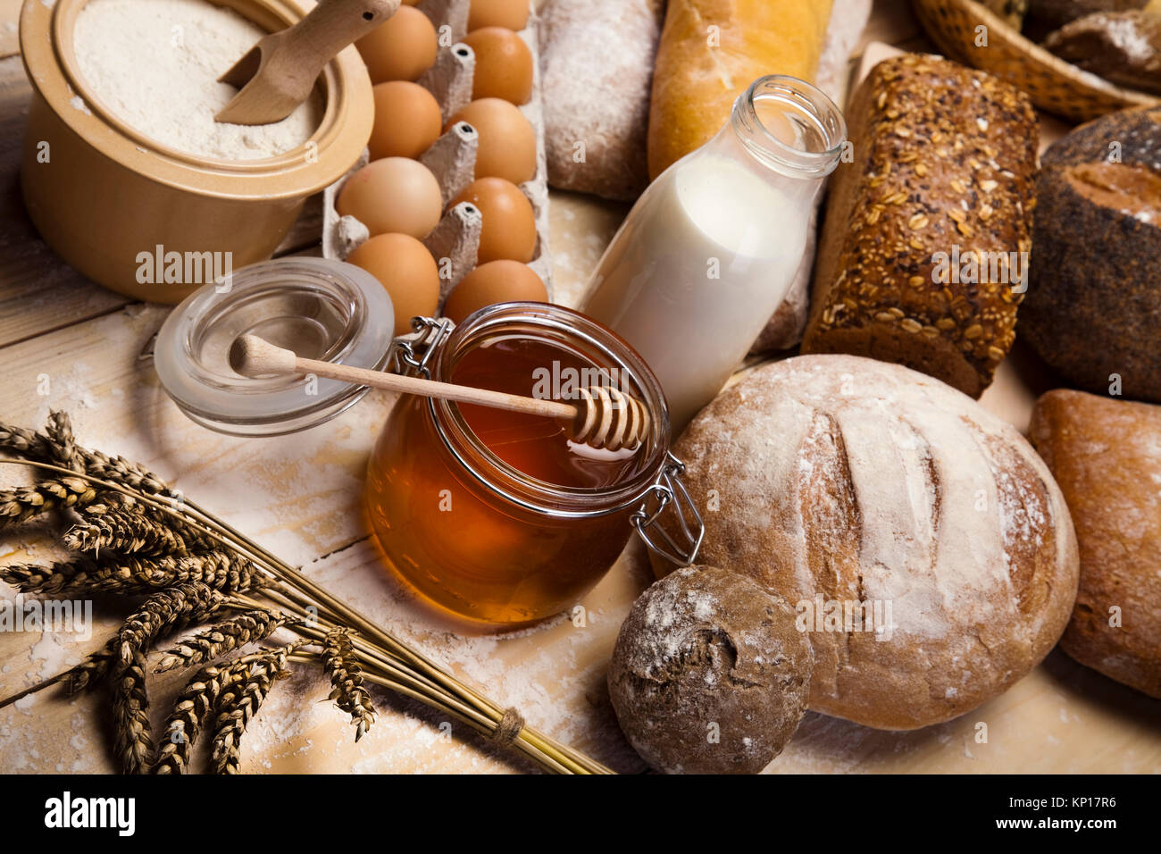Rural theme of bread and natural food Stock Photo - Alamy