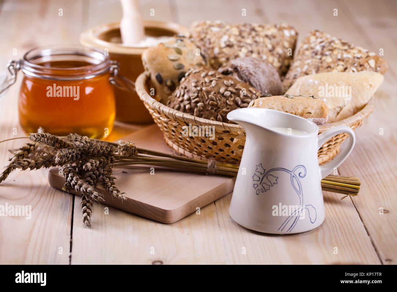 Rural theme of bread and natural food Stock Photo - Alamy