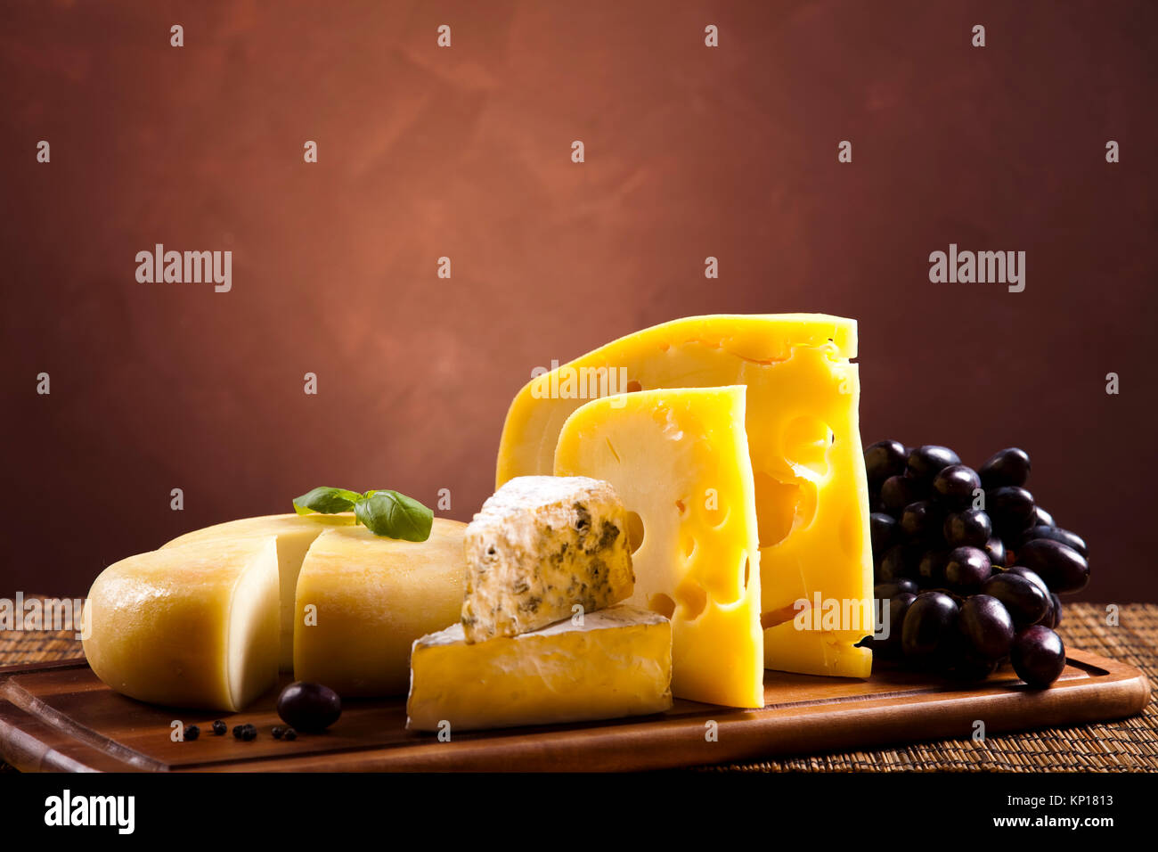 Still-life with cheese, saturated ambient rural theme Stock Photo - Alamy