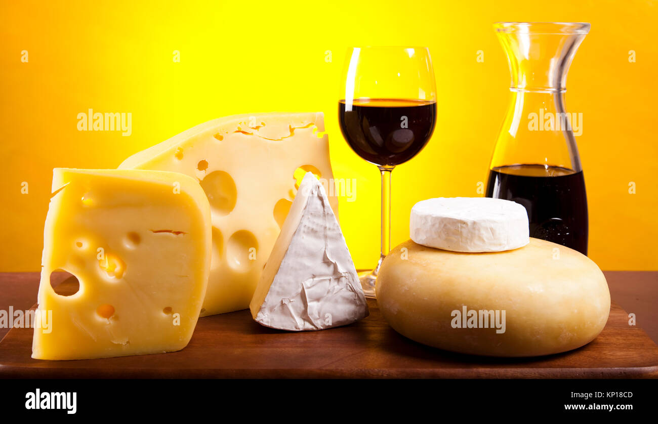 Various types of cheese, saturated ambient rural theme Stock Photo - Alamy