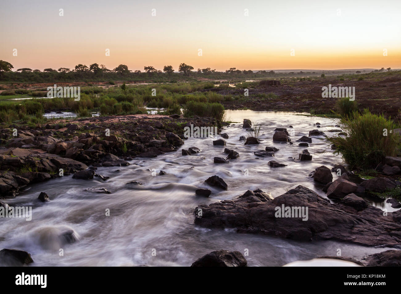 Sunset in Sabie river in Kruger National park, South Africa Stock Photo ...