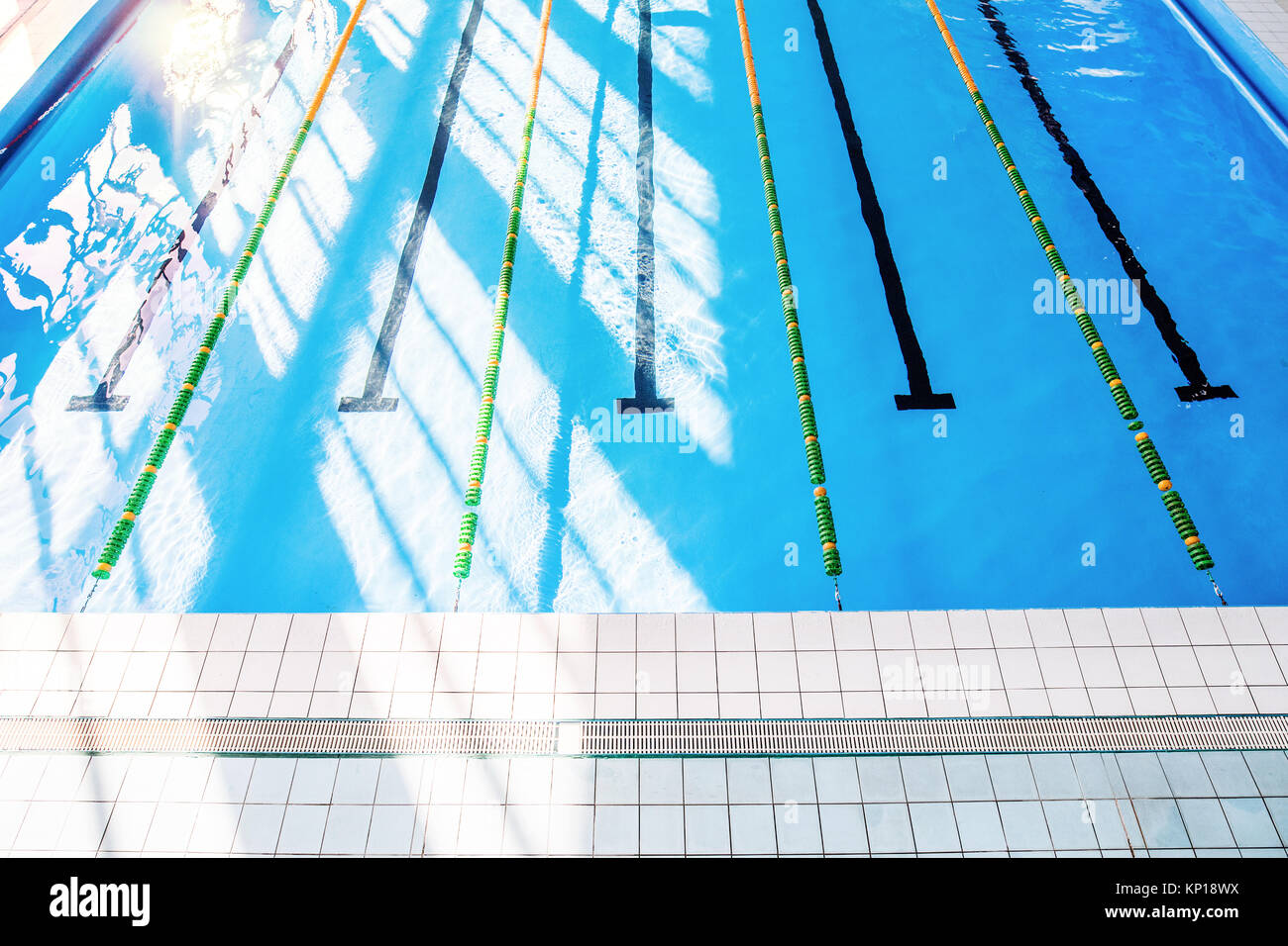Lanes of an indoor public swimming pool Stock Photo - Alamy