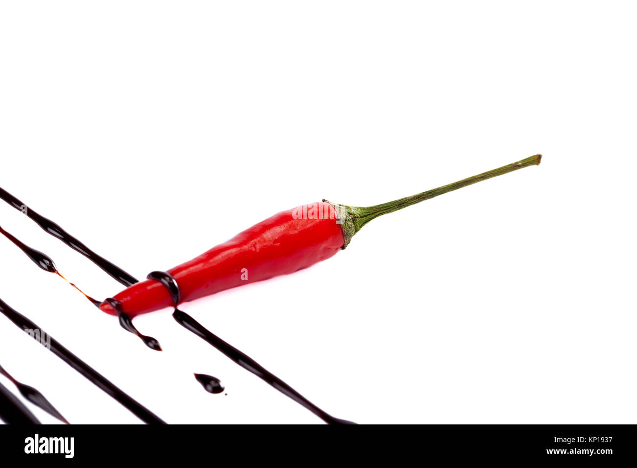 red chili with chocolate drip Stock Photo - Alamy