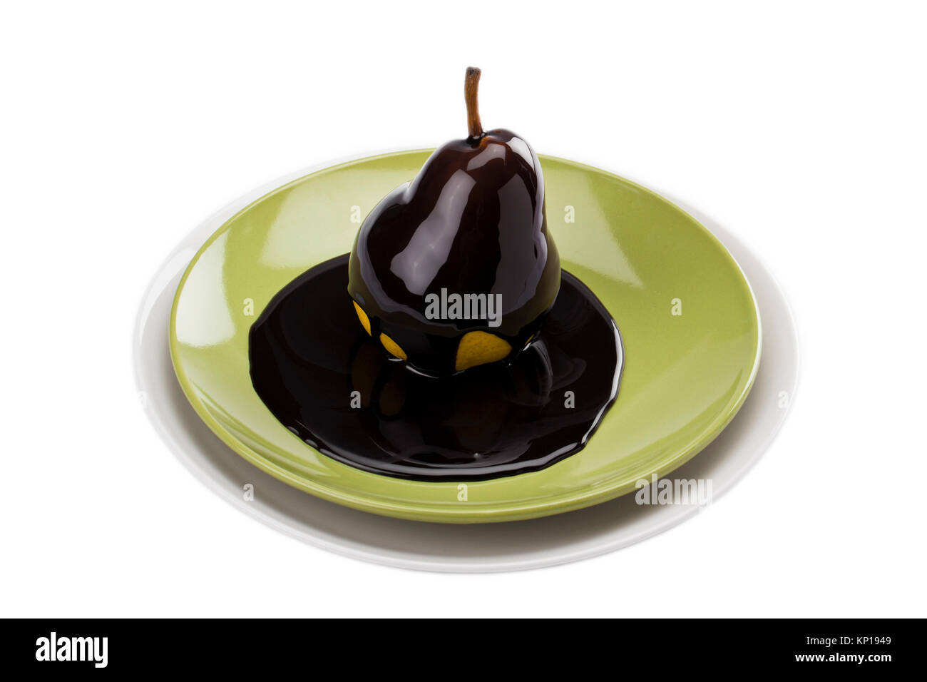 pear dipped in chocolate syrup Stock Photo - Alamy