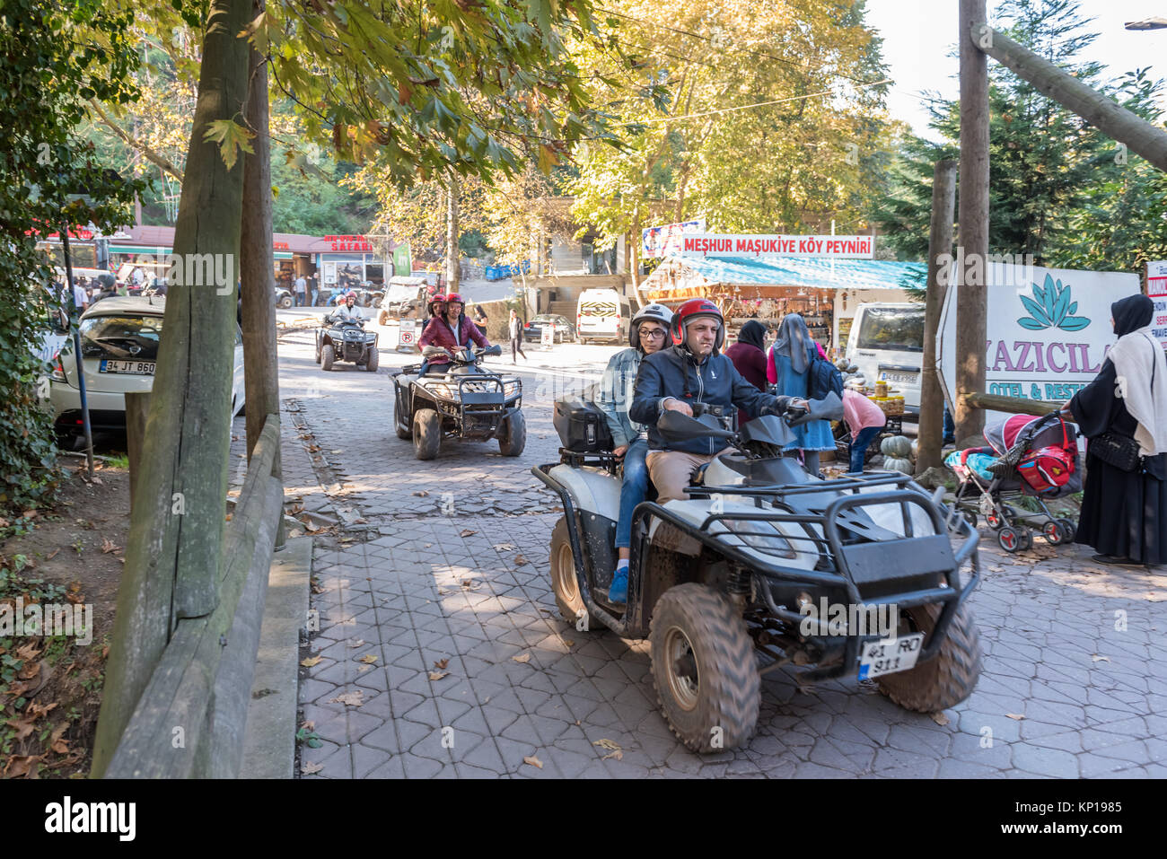 Unidentified people riding quad bikes ATV at Masukiye,a popular ...